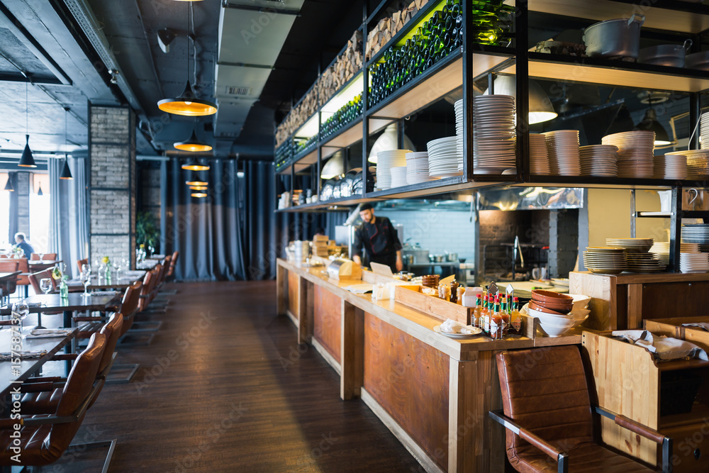 modern loft style restaurant decoration with hanging light bulb beer ...