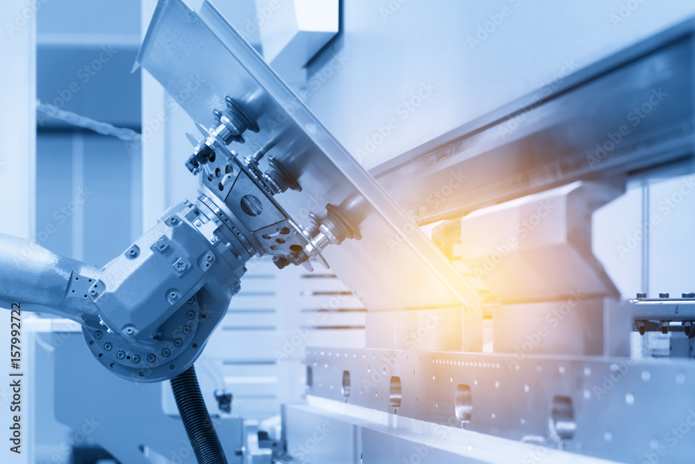 The automatic robot arm for sheet metal forming factory. Industrial 4.0 ...