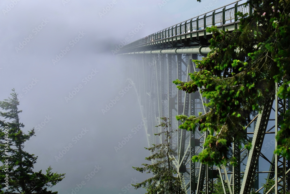 Deception Pass Bridge in fog. Arch bridge. Deception Pass State Park ...