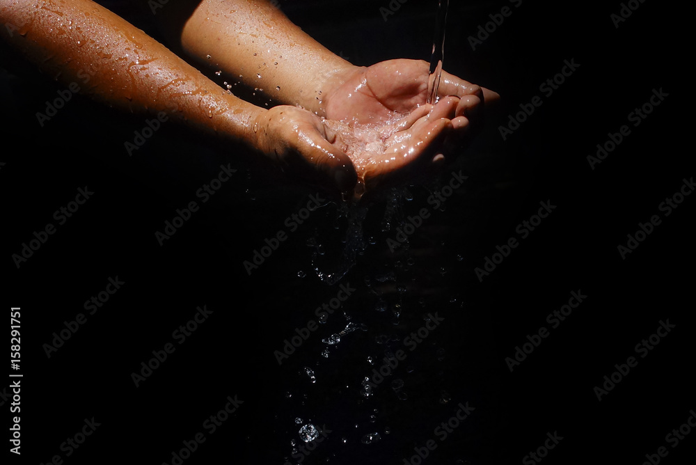 Human Hand Capturing The Water That Is Flowing With Motion Blur Effect ...
