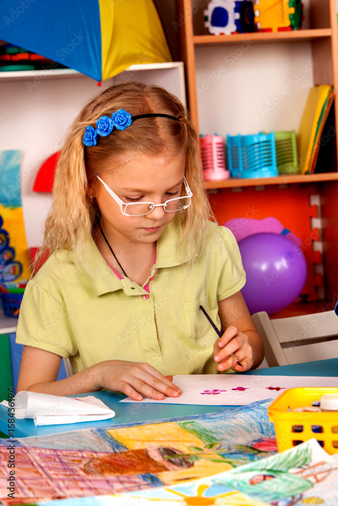 Small students painting in art school class. Child drawing by paints on ...