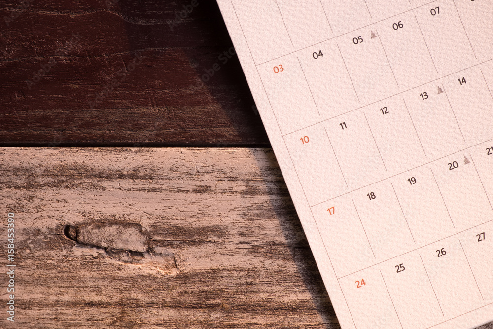 top view and warm. white desktop calendar putting on wooden are ...