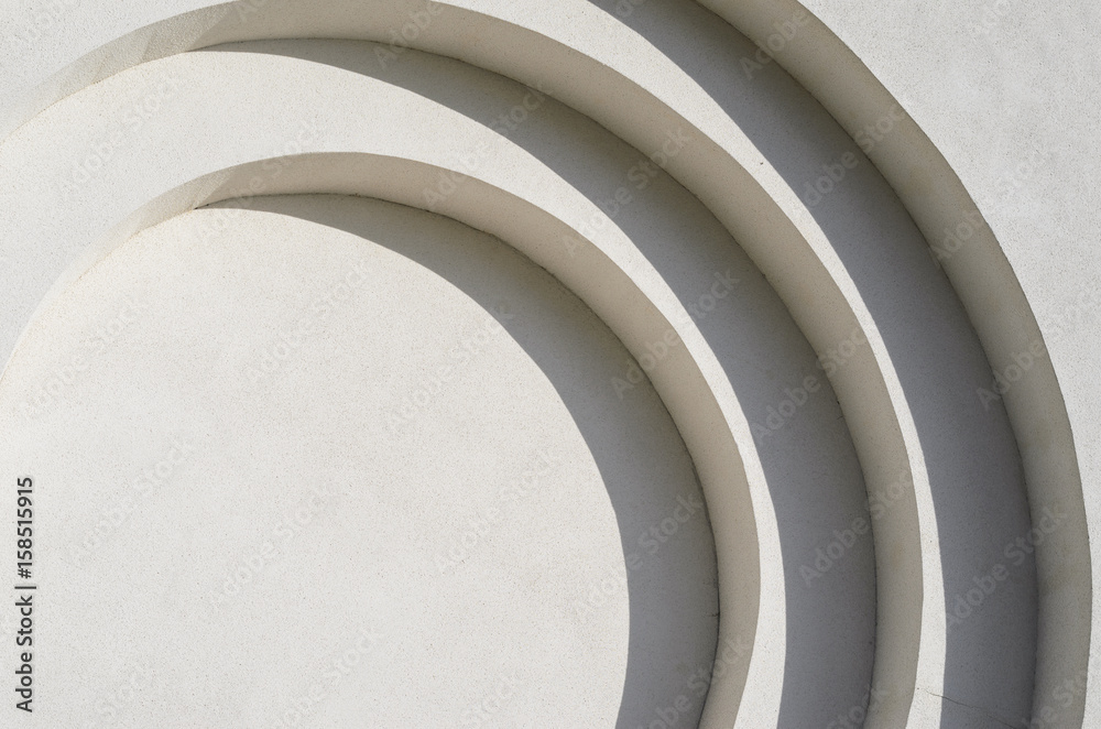 Abstract lines of arches in a white plastered wall. Abstract background ...