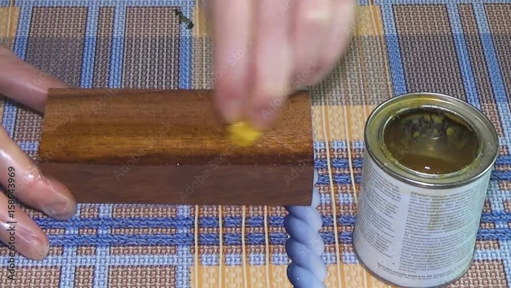 Vidéo Stock Meranti wood. The bar of solid wood is covered with stain ...