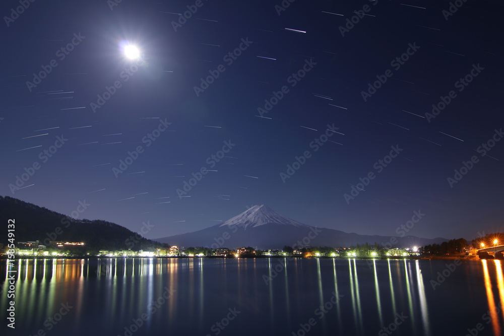 Beautiful scenery of the moon and startrail on night sky at Mountain ...