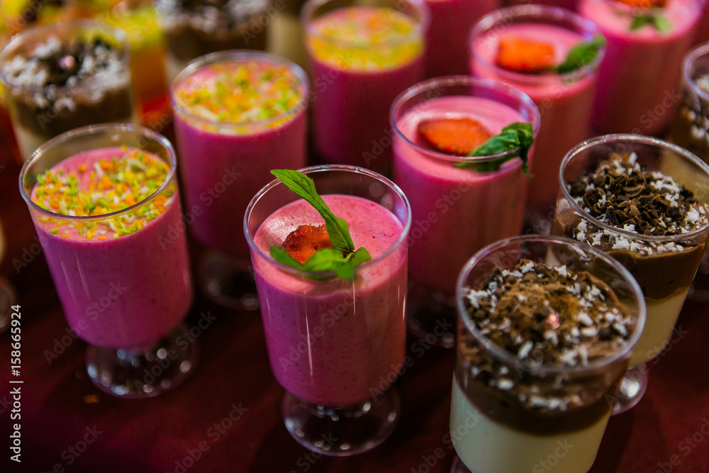 Mousse dessert variation. Buffet mousse dessert in a little glass ...
