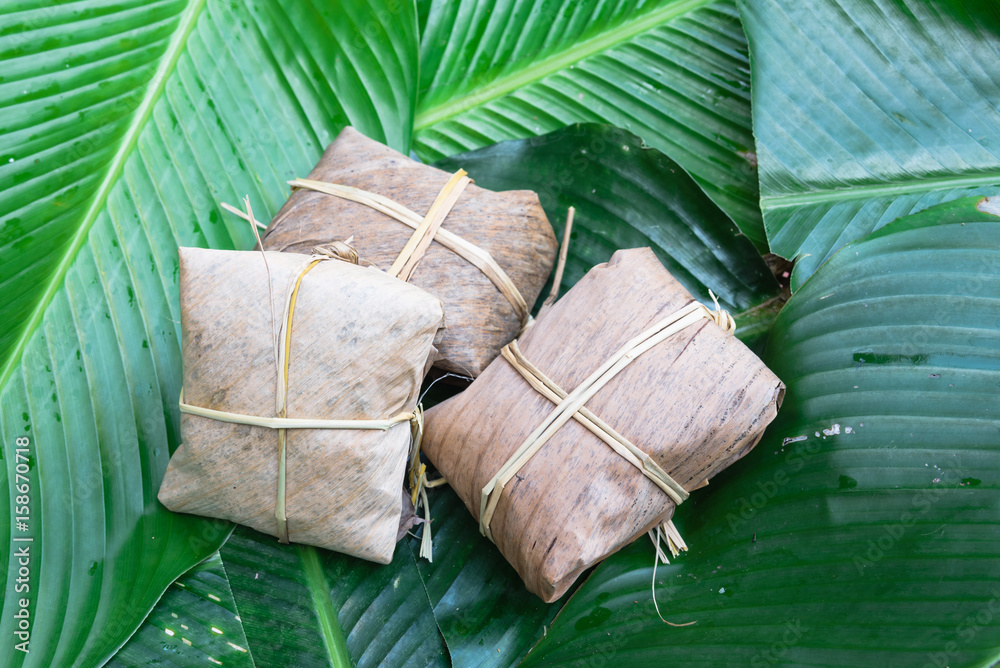 Close-up group of traditional cakes from the North of Vietnam wrapped ...