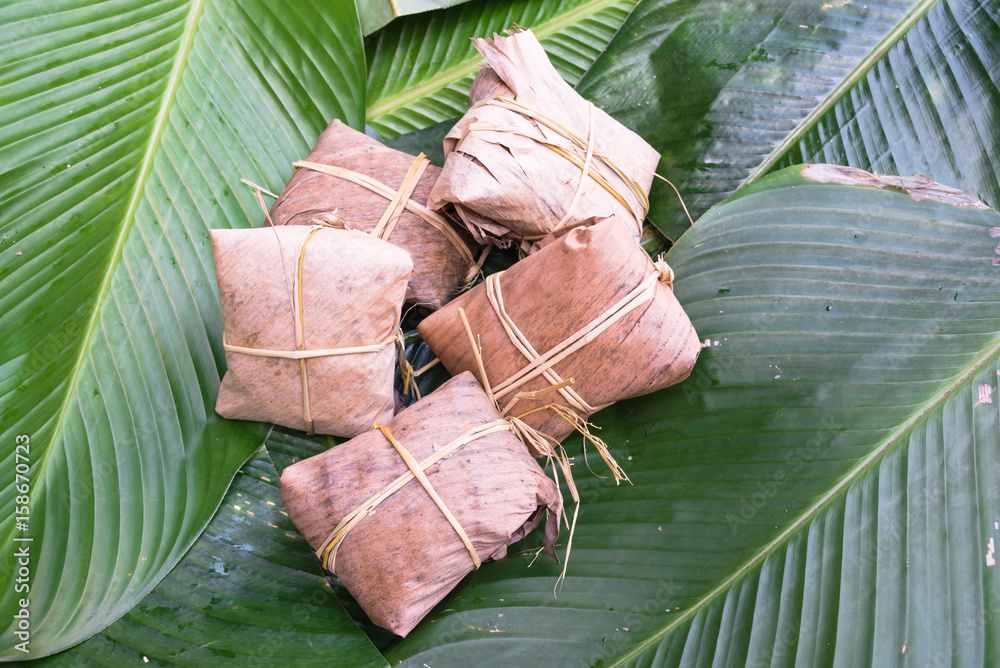 Close-up group of traditional cakes from the North of Vietnam wrapped ...