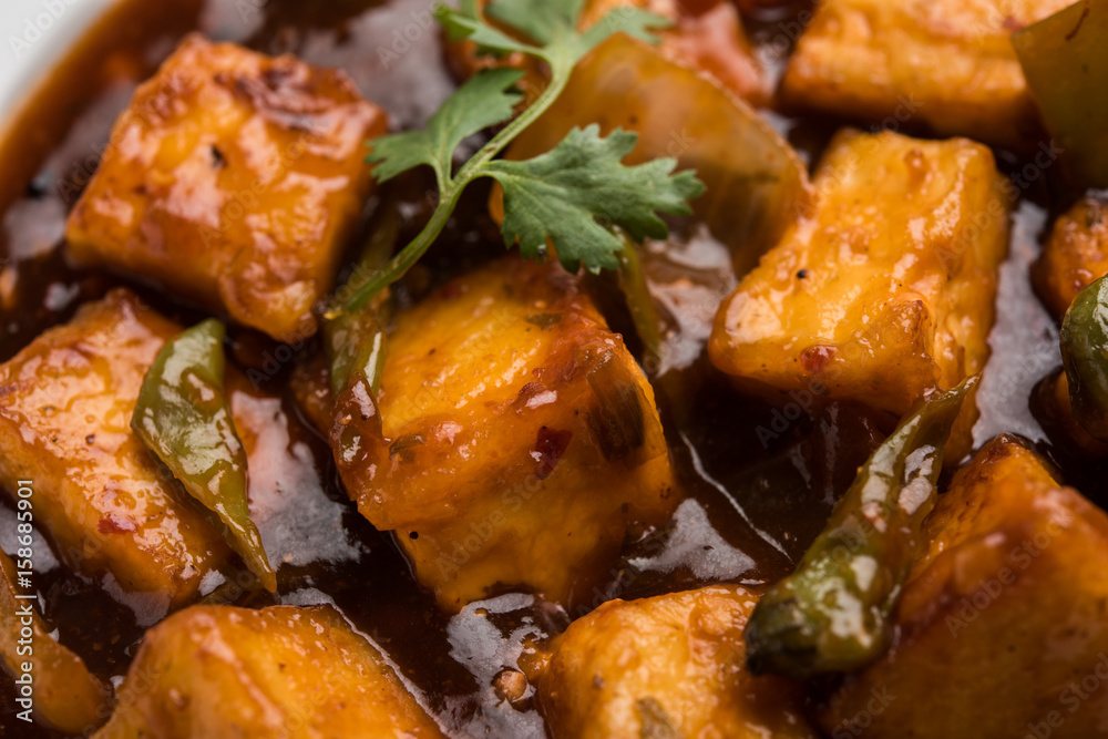 Spicy Paneer or chilli paneer or cottage cheese, served in white Dish ...