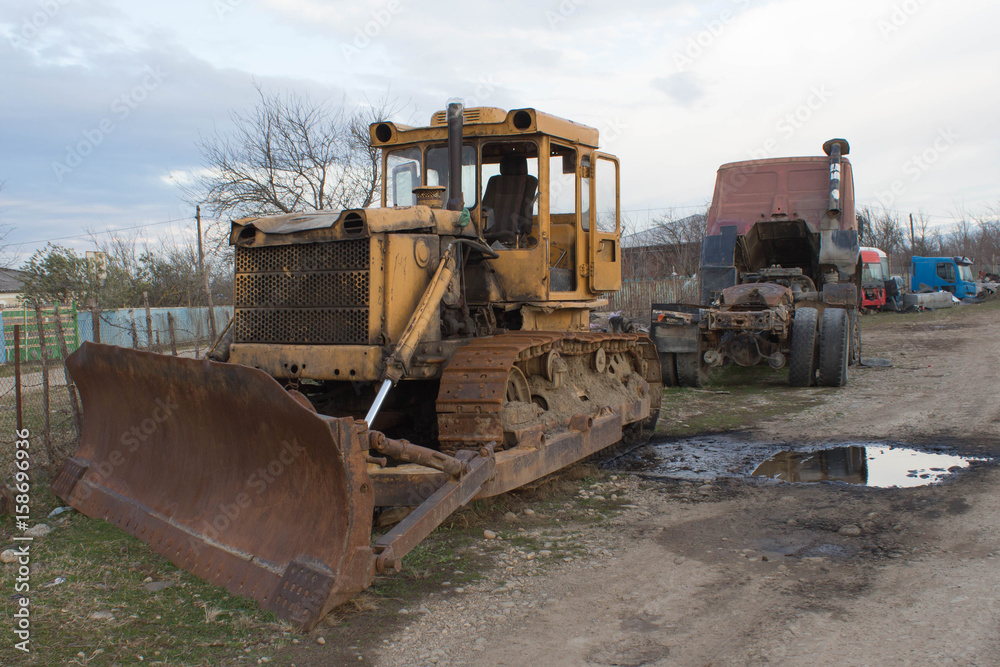 Old abandoned bulldozer. Old rusty and weathered bulldozers Stock Photo ...