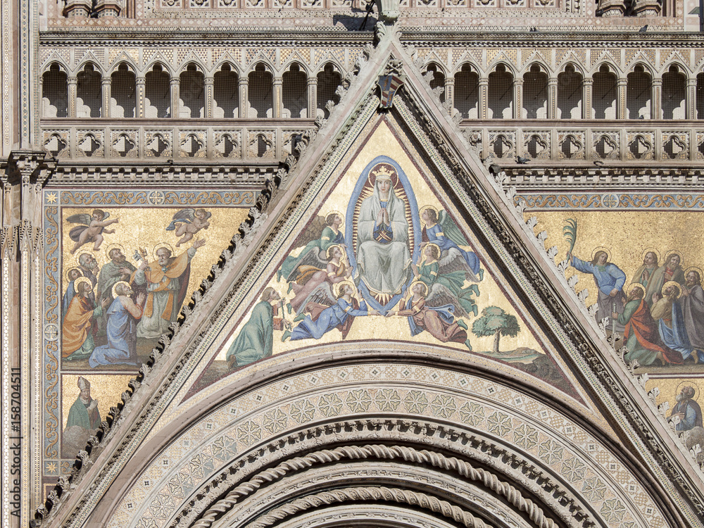 The upper part of the arch with wall paintings, mosaic, murals, spiral ...