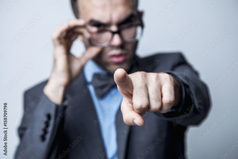 Hey You! Portrait of a businessman pointing at you. (Body language ...
