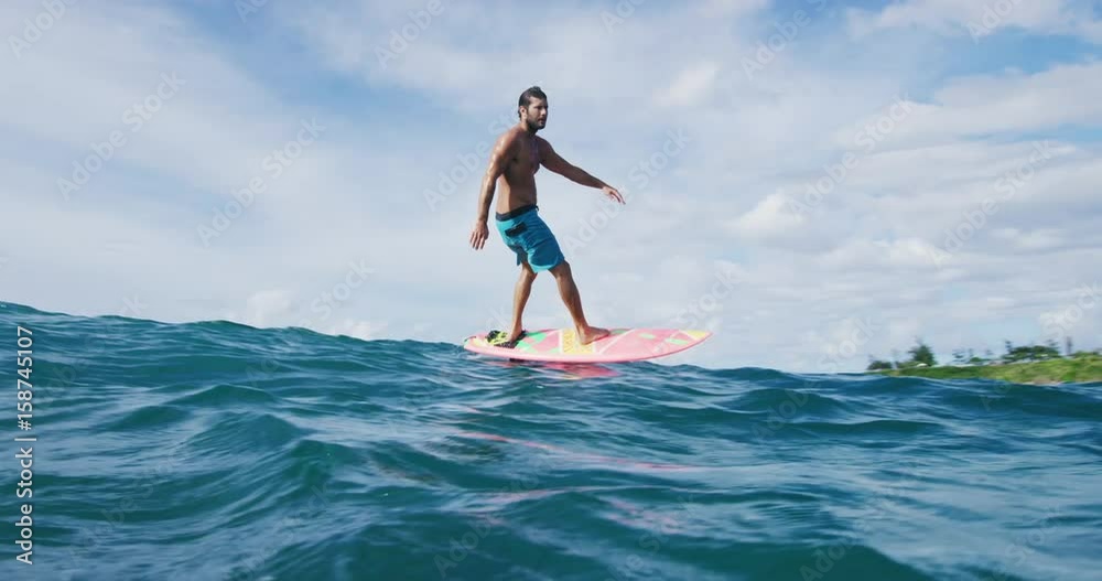 Surfer on hydrofoil surfboard riding blue ocean wave. Futuristic ...