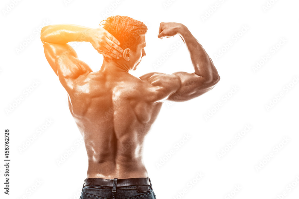 Strong Athletic Man Fitness Model posing back muscles, triceps o Stock ...