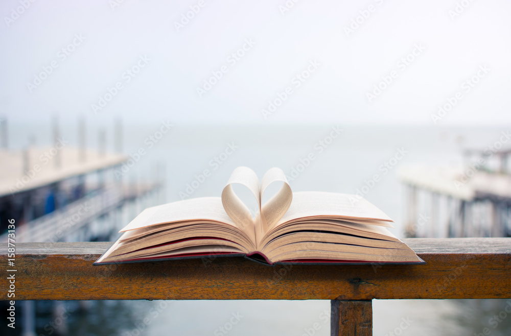 Heart shape made of open book pages Stock Photo | Adobe Stock