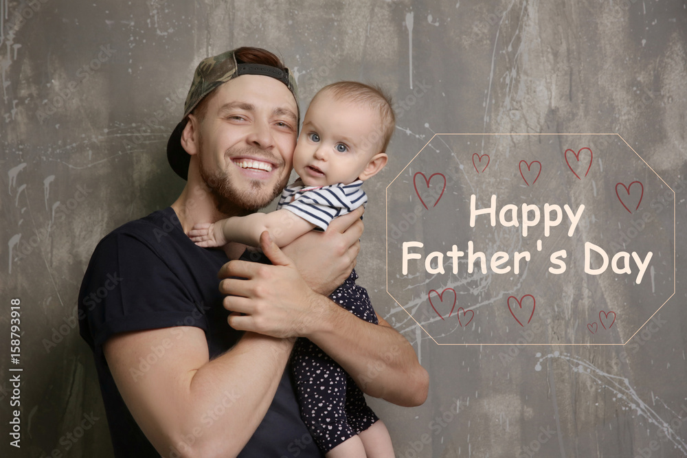 Father posing with cute baby daughter on grunge background Stock Photo ...