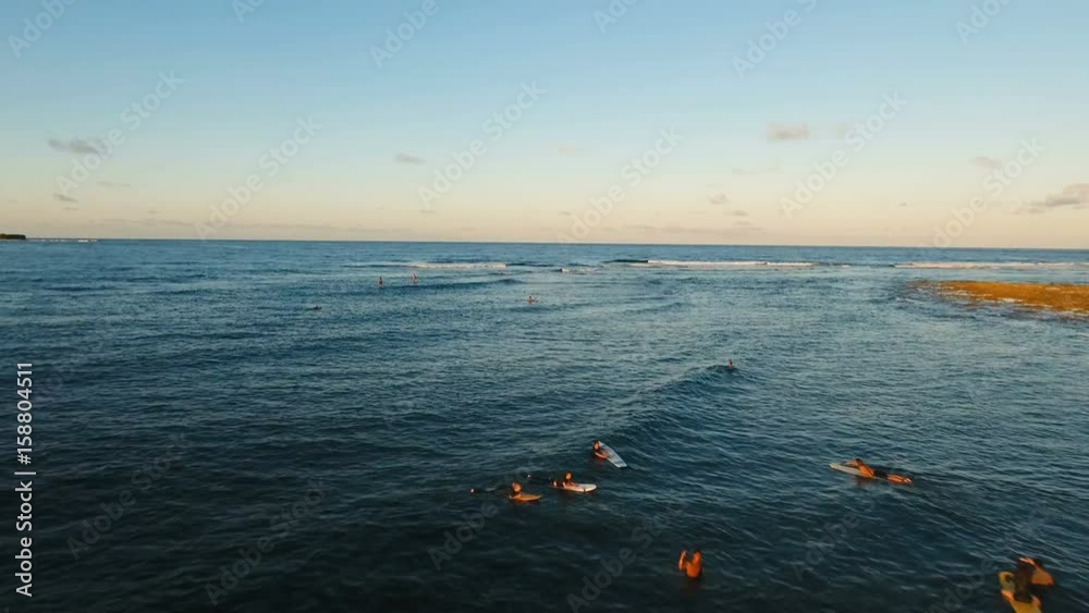 Surfers at sunset in siargao islands famous surf break cloud 9 near ...