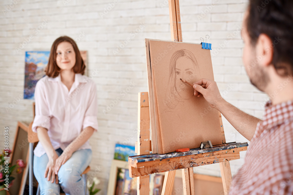 Photo & Art Print Back view portrait of artist sketching models ...