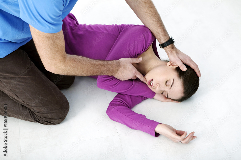 First aid techniques : placing the victim in the recovery position Step ...