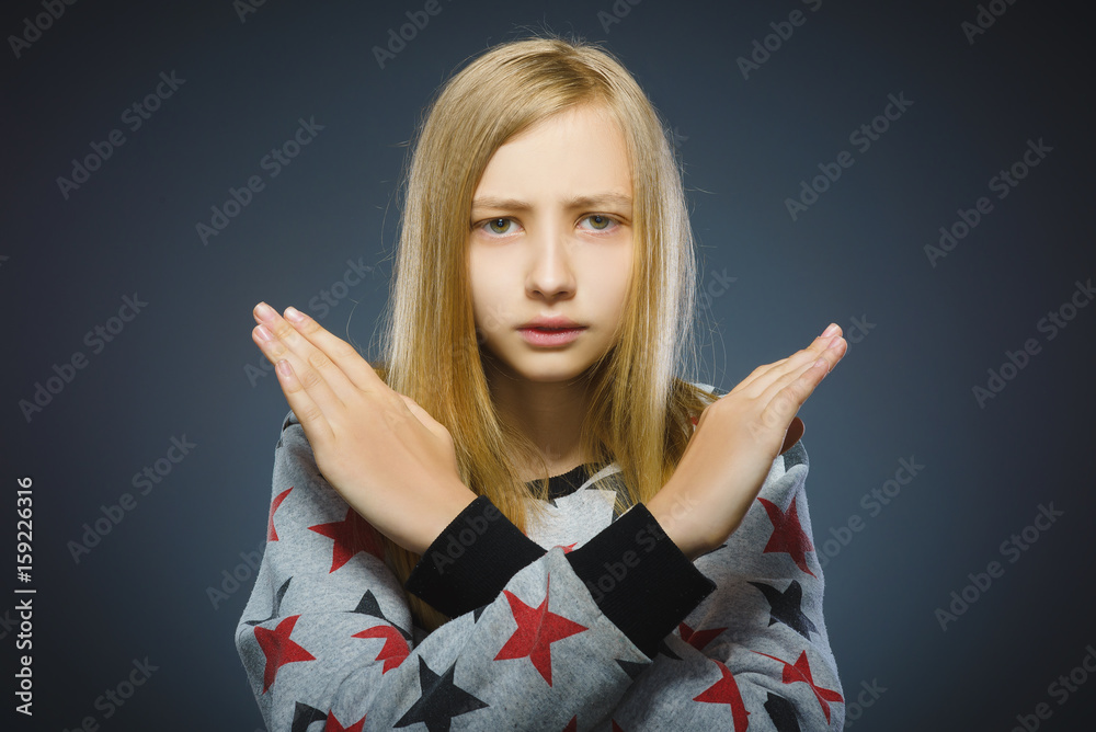 Serious girl making X sign with her arms to stop doing something Stock ...