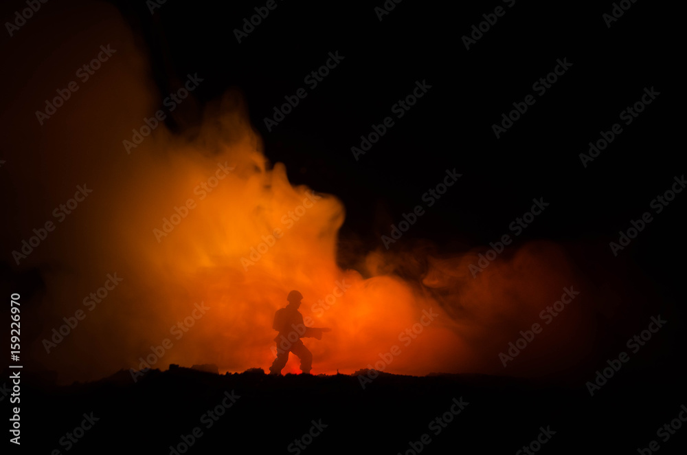 War Concept. Military silhouettes fighting scene on war fog sky ...