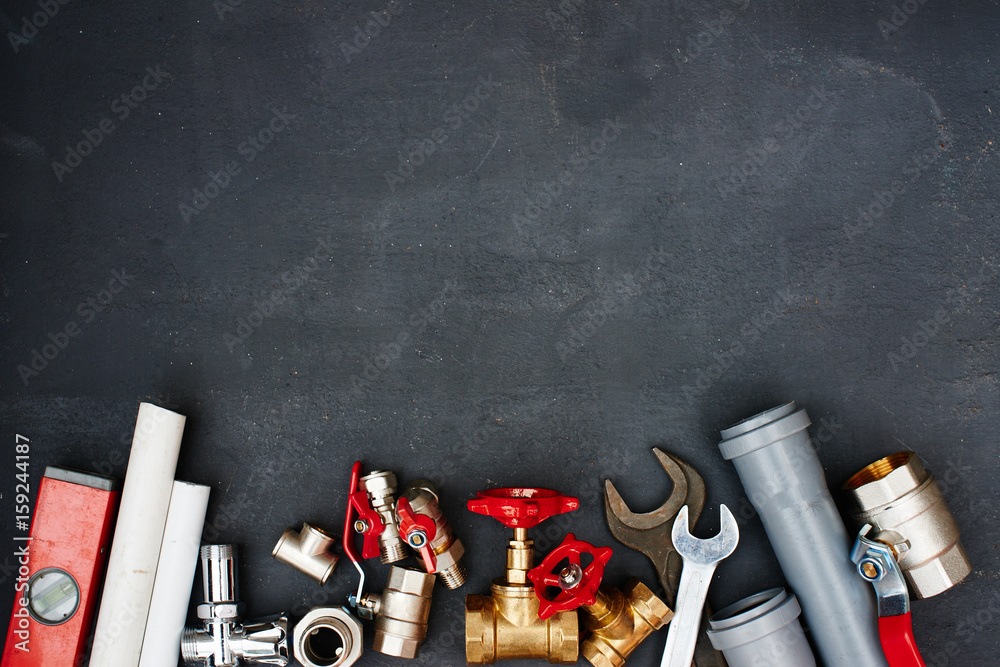 Top view of the plumbing equipment on a black background Stock Photo ...