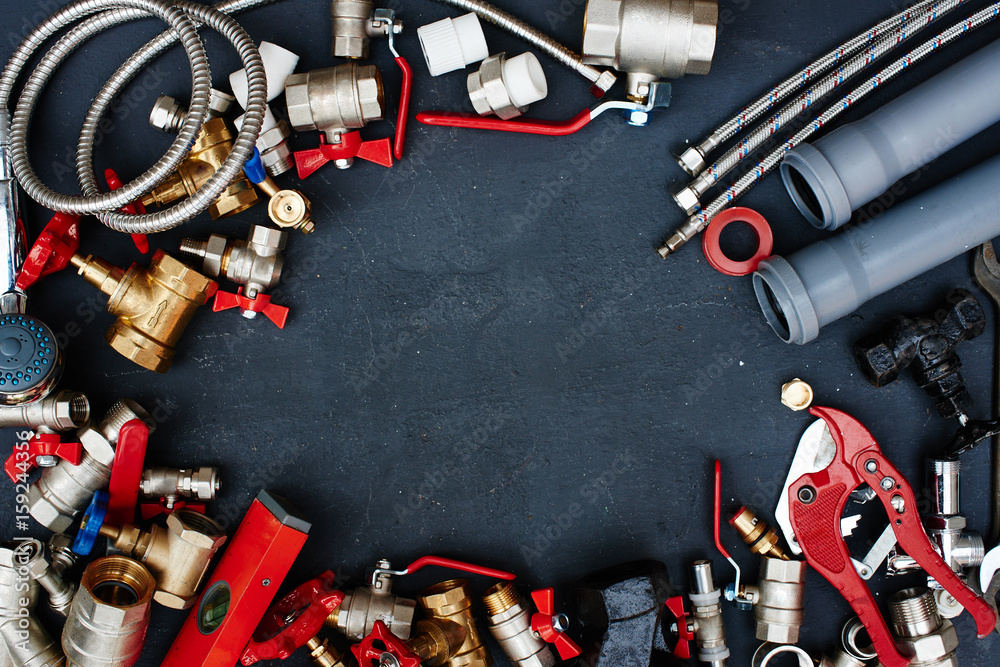 Top view of the plumbing equipment on a black background Stock Photo ...