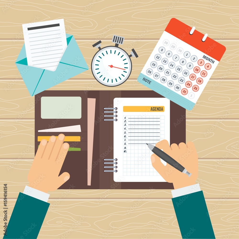 Businessman writes a daily routine. Schedule and planning in management ...