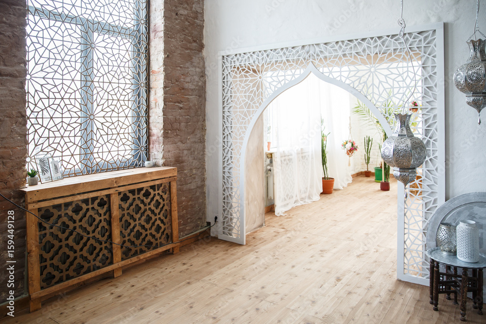 Eastern traditional interior. Arabic style room. Arch and window with ...