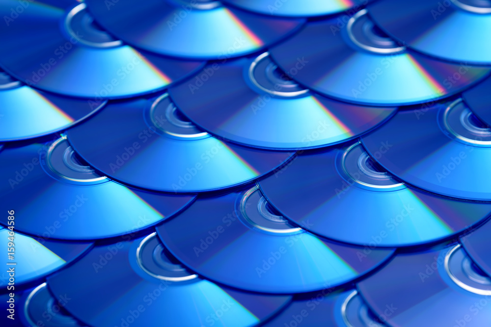Compact discs background. Several cd dvd blu-ray discs. Optical ...