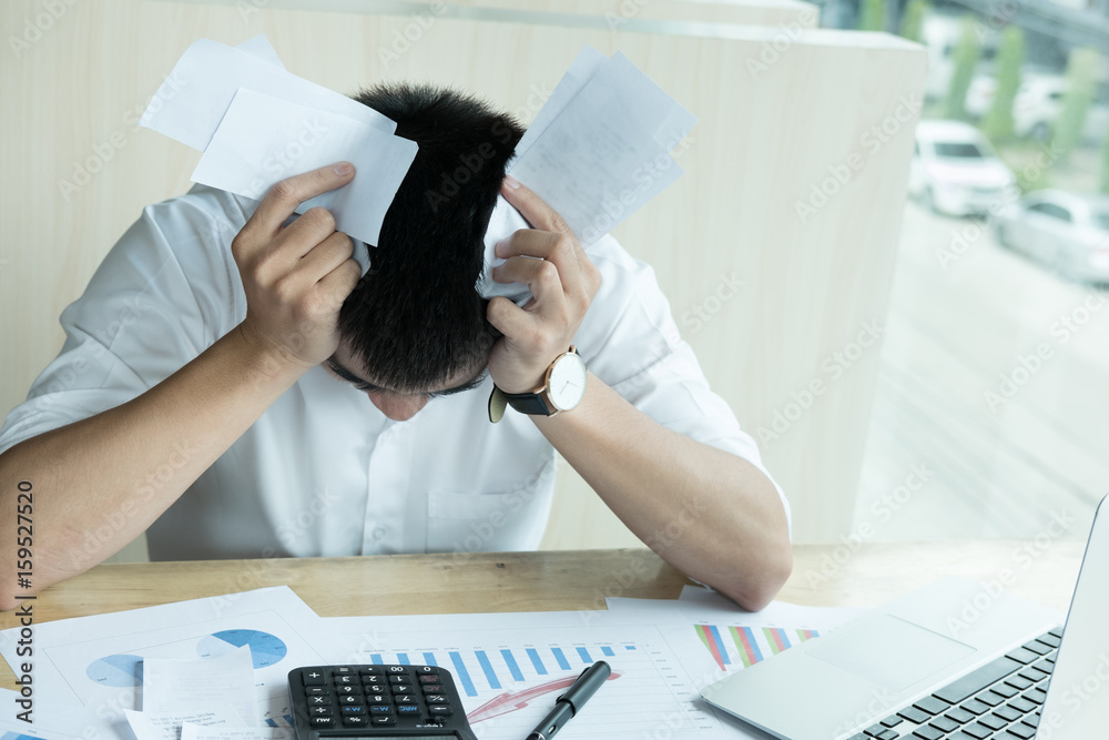 Man calculate domestic bills at home. Businessman using calculator at ...