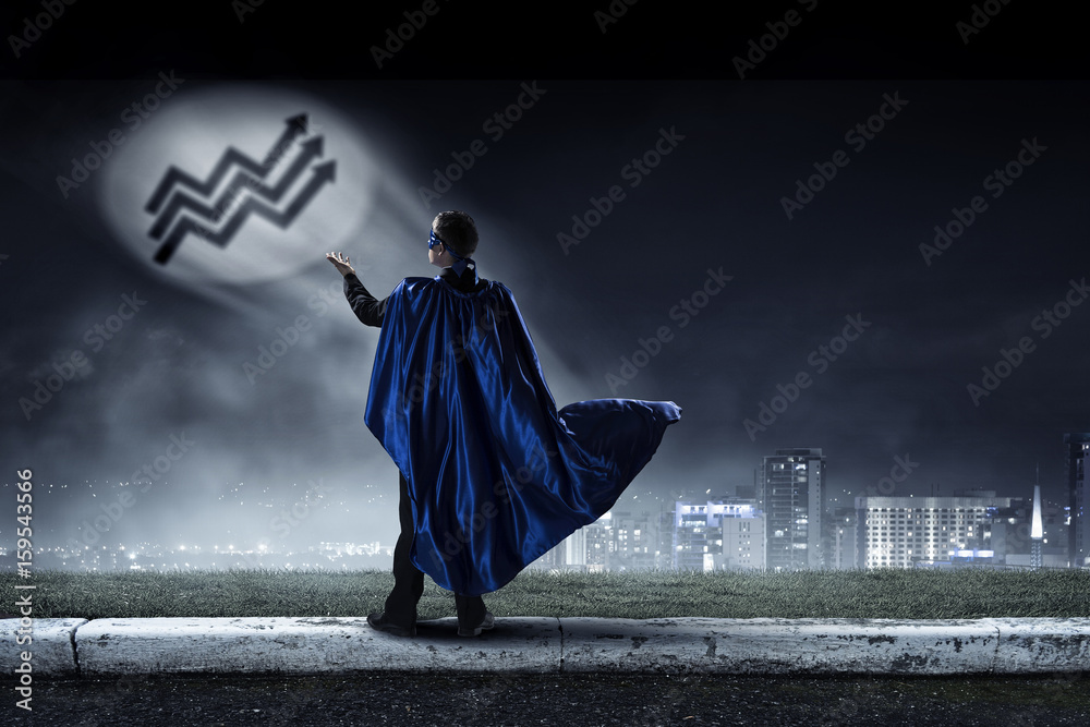 Strong and powerful as super hero . Mixed media Stock Photo | Adobe Stock