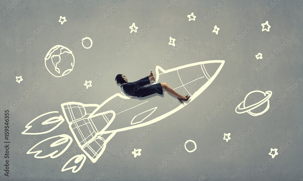 Woman riding space rocket. Mixed media Stock Photo | Adobe Stock