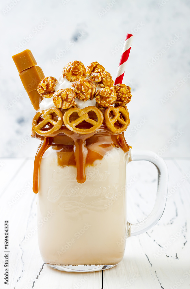Salted caramel indulgent exreme milkshakes with brezel waffles, popcorn ...