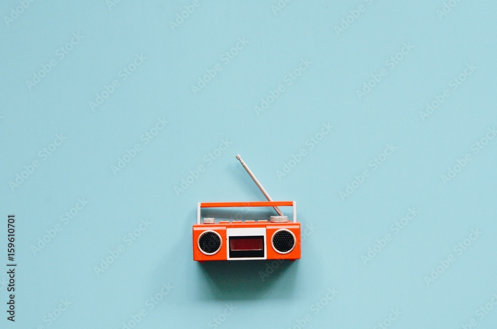 vintage radio and recording music over blue background Stock Photo ...