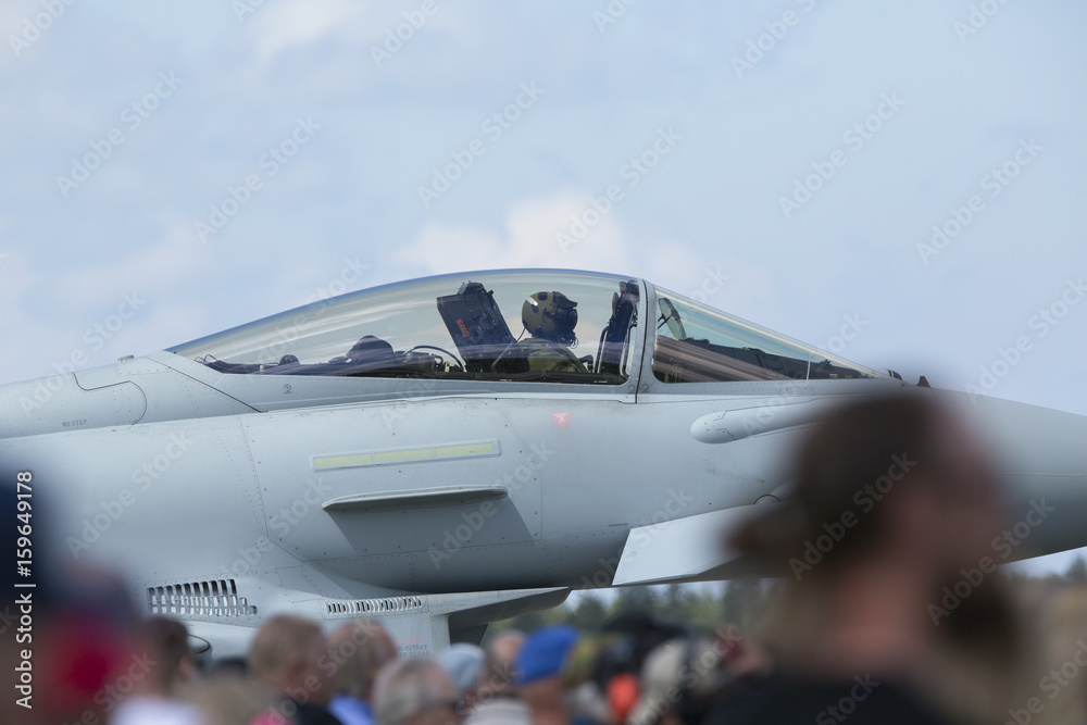 Pilot in the cockpit of a modern jet fighter. Tactical fighter of the ...