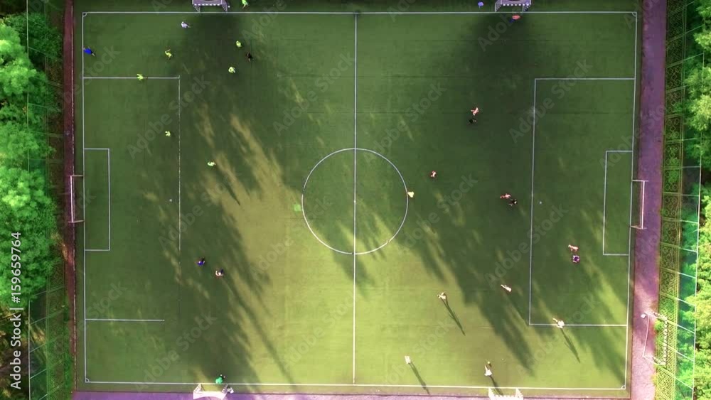 Typical process of playing football between two teams outdoor. Two ...