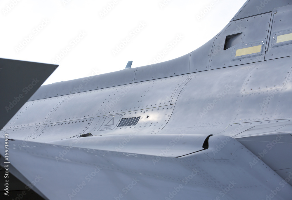 Metal surface of a modern tactical fighter. Round shape and design of ...