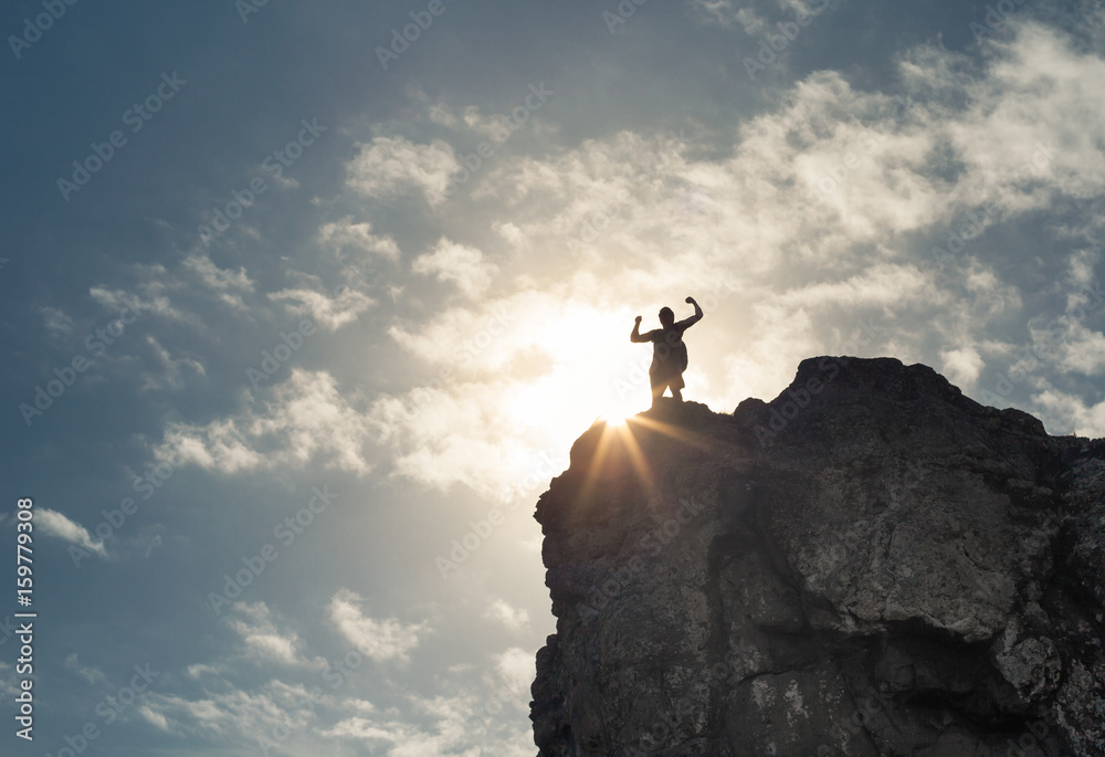 People power, success, triumph, and life goals concept. Man standing on ...