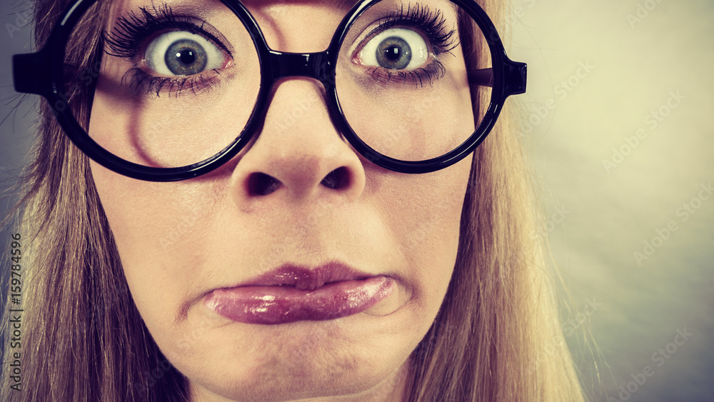 Closeup woman shocked face with eyeglasses Stock Photo | Adobe Stock