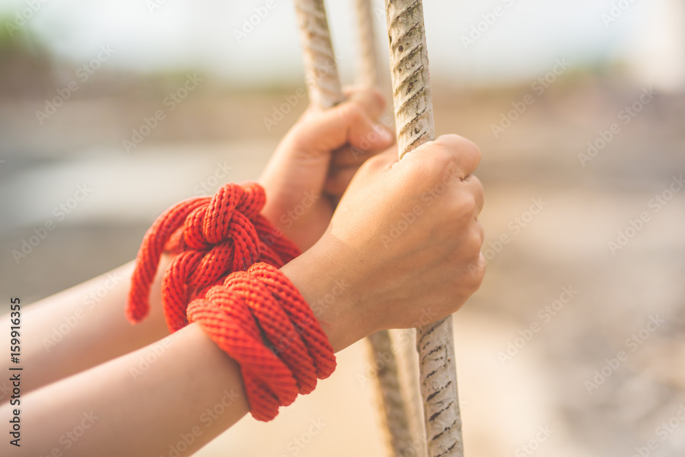 Women of a victim tied up with rope Stock Photo | Adobe Stock
