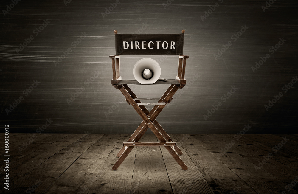 Director chair and megaphone, scene in dark room Stock Photo | Adobe Stock