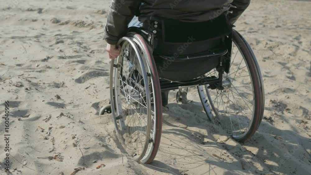 Vidéo Stock Disabled man in wheelchair, makes failed attempts steer ...