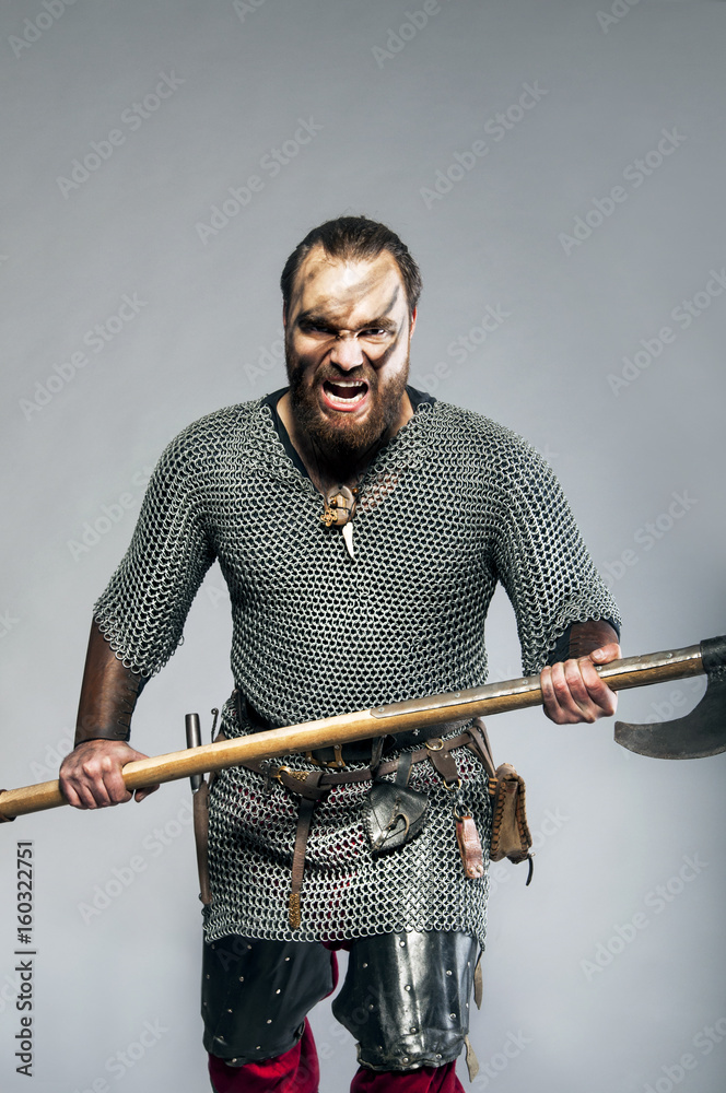 Screaming viking with his axe on the grey background Stock Photo ...