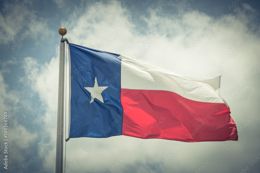 Large Texas (The Lone Star) flag waving on flag pole with cloud blue ...