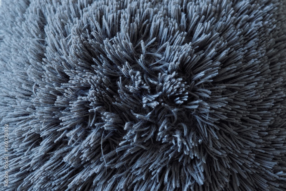 Beautiful grey fluffy rug with long wool Stock Photo | Adobe Stock