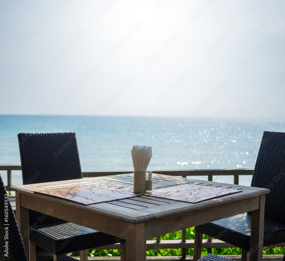 Table setting at beach restaurant, sea view and sky background Stock ...