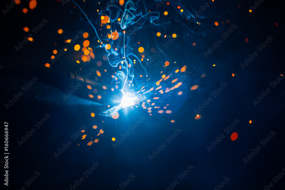 Foto de abstract welding sparks light, industrial background do Stock ...