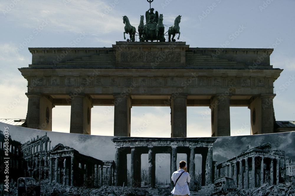 The Brandenburg Gate in Berlin is one of the best-known landmarks of ...