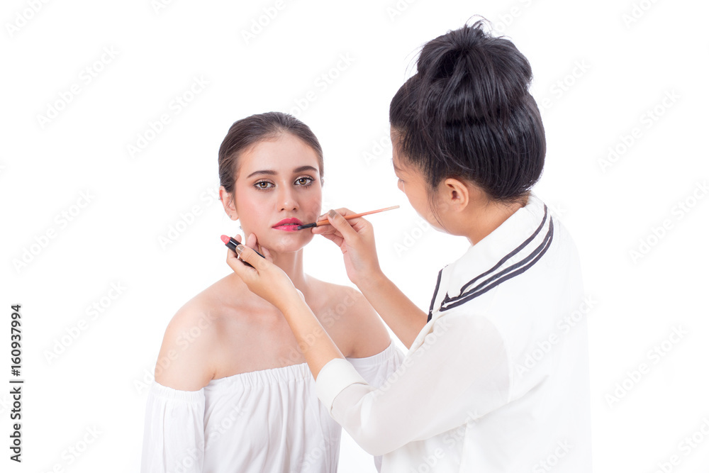 Professional asian akeup artist applies eyeliner, Beautiful woman face ...